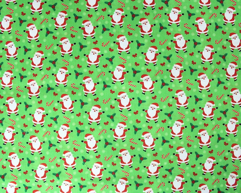 Polycotton Christmas Santa Canes on Green – Escape & Create
