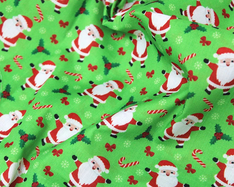 Polycotton Christmas Santa Canes on Green – Escape & Create